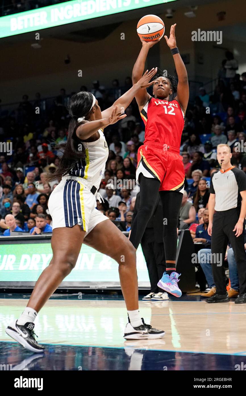 Las Vegas Aces guard Chelsea Gray (12) shoots over Dallas Wings center ...