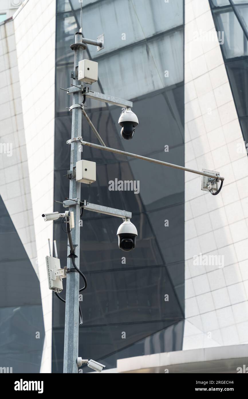 Pole with CCTVs which is located at the street for security and ...
