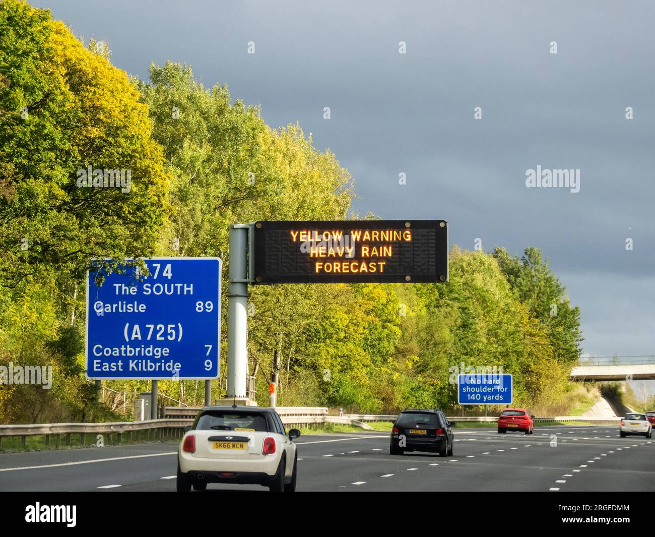 Warning signs on motorway Stock Photo - Alamy