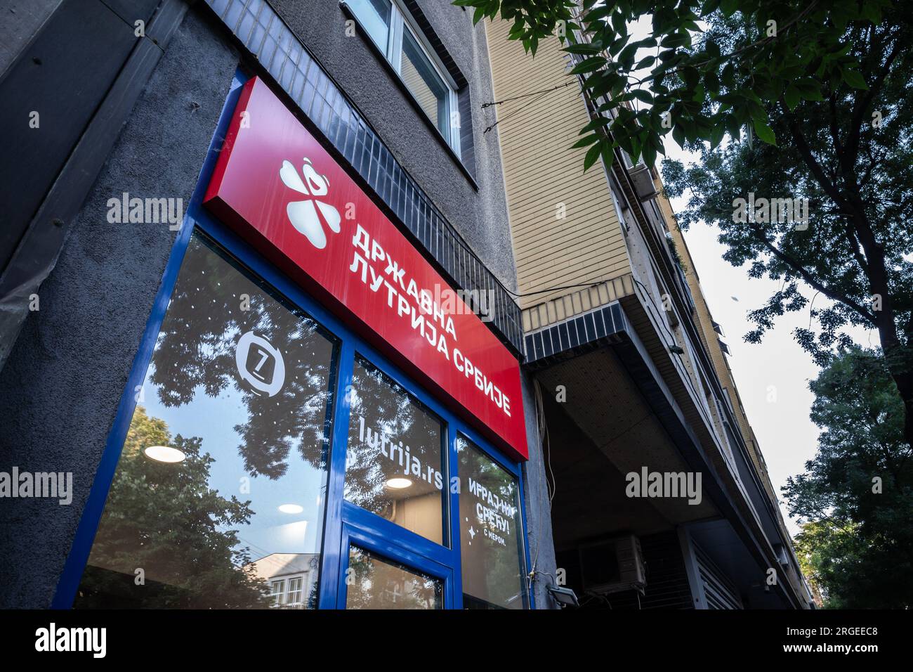 Picture of a sign with the logo of Drzavna Lutrija Srbije on their ...