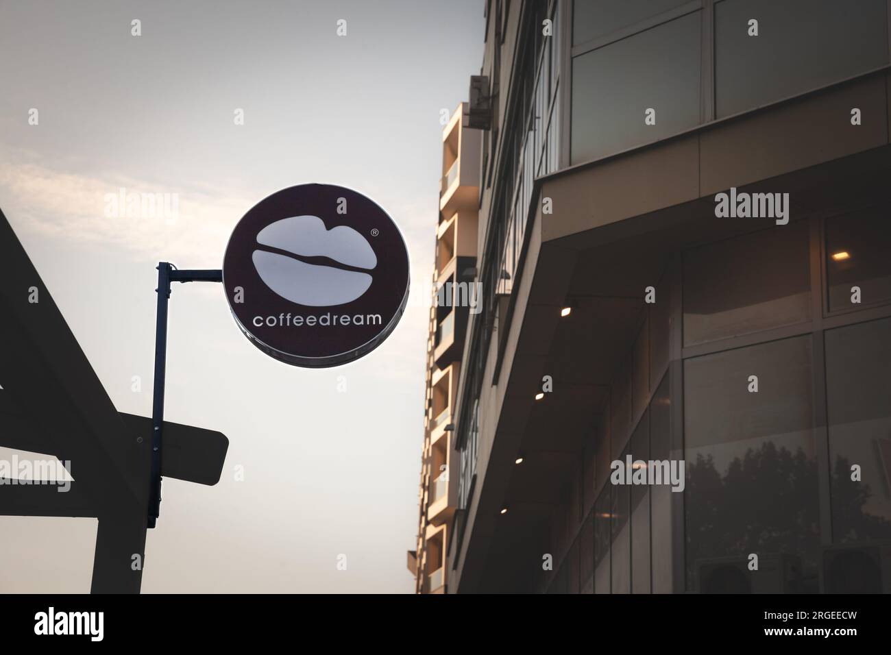 Picture of a sign with the logo of Coffee Dream on their main cafe for ...