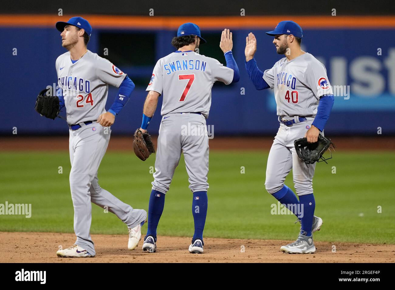 Chicago Cubs center fielder Cody Bellinger (24), shortstop Dansby Swanson (7), and right fielder ...