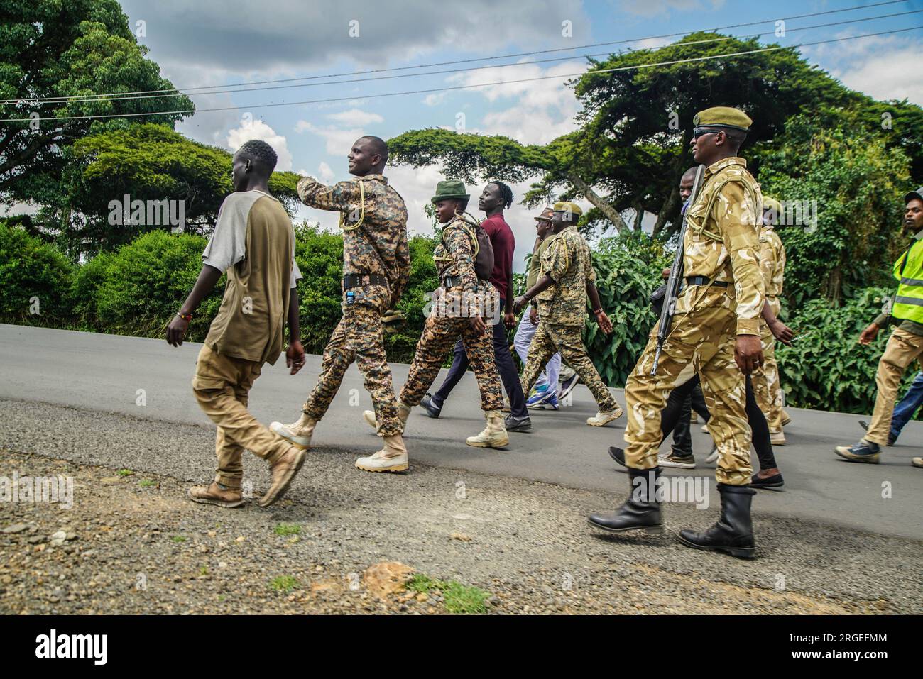 Kenyan elephant campaigner and research scientist, Jim Justus Nyamu (R2 ...