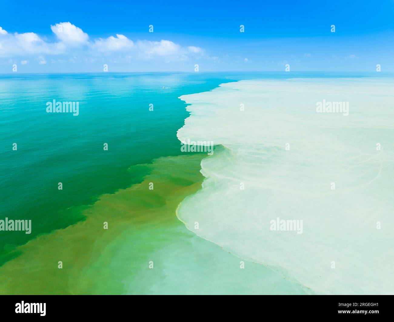 Aerial view of the dirty oily stain and pollution on the coast sea ...