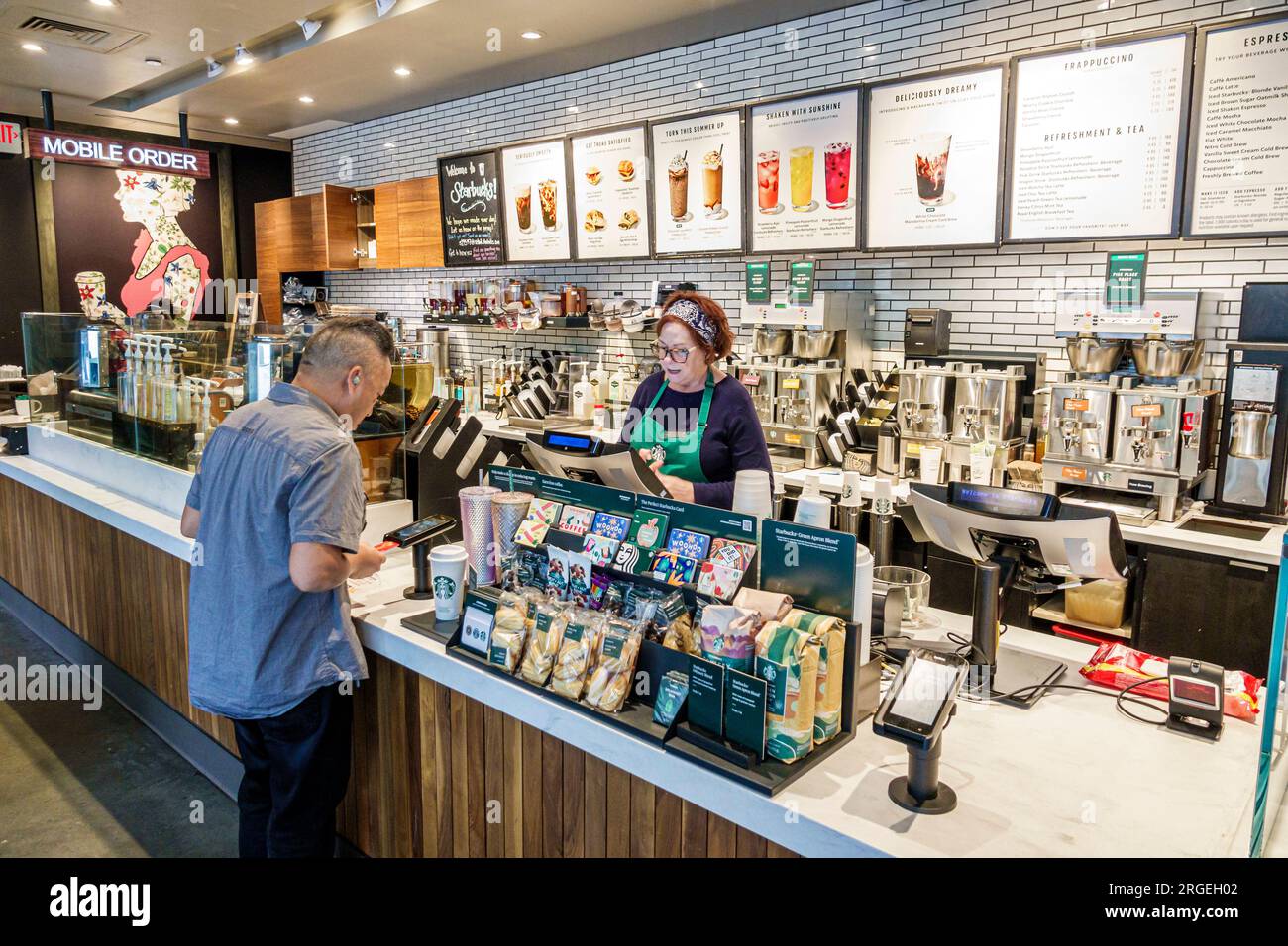 Charlotte North Carolina,Starbucks Coffee,barista taking order,credit ...