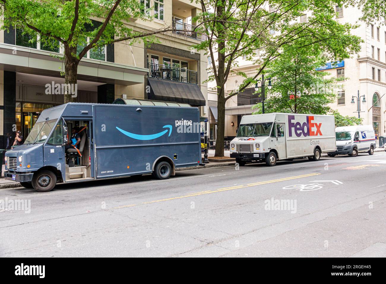 Charlotte North Carolina,South Tryon Street,competing delivery vans ...
