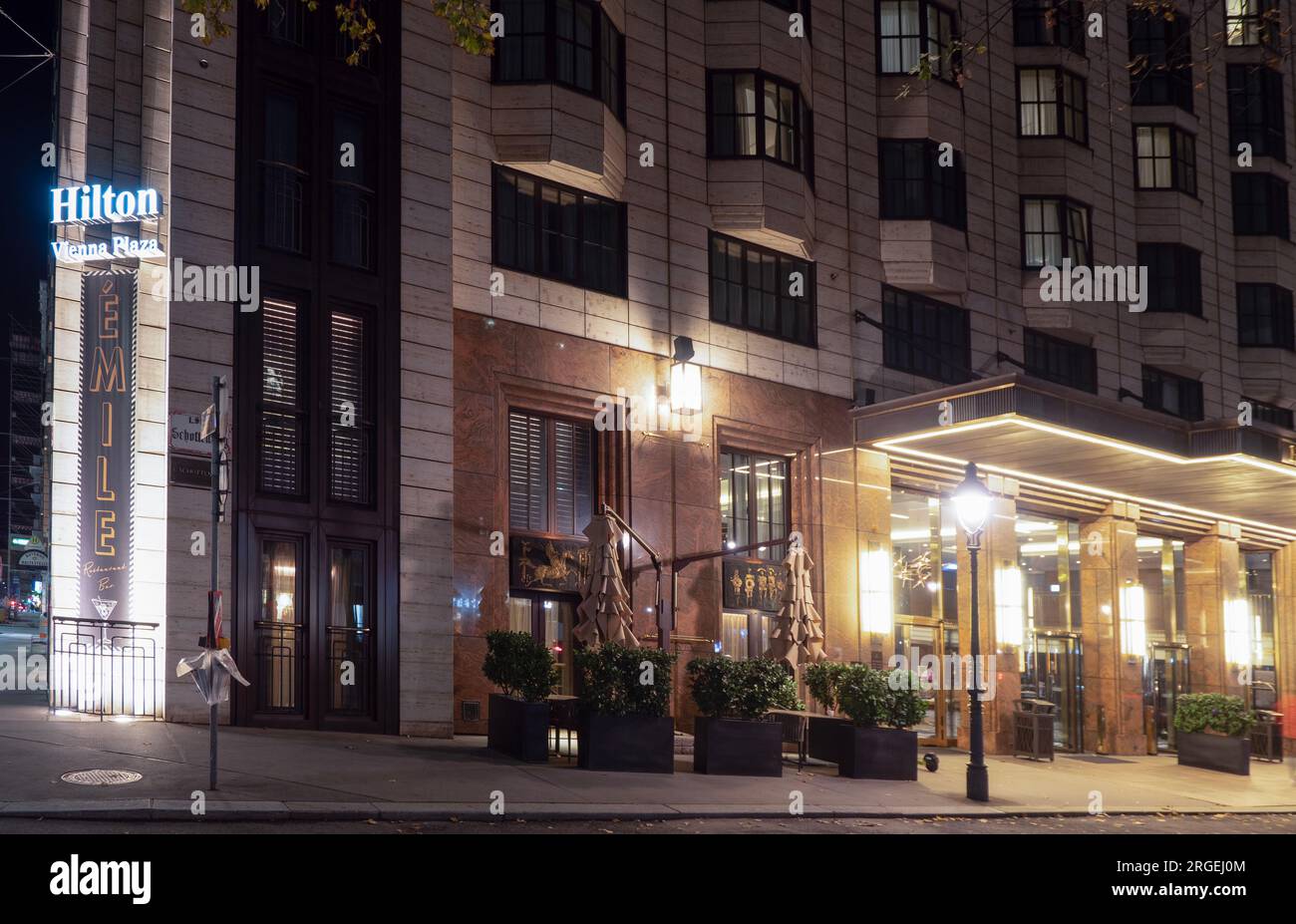 Hilton Vienna Plaza Hotel at night Stock Photo - Alamy