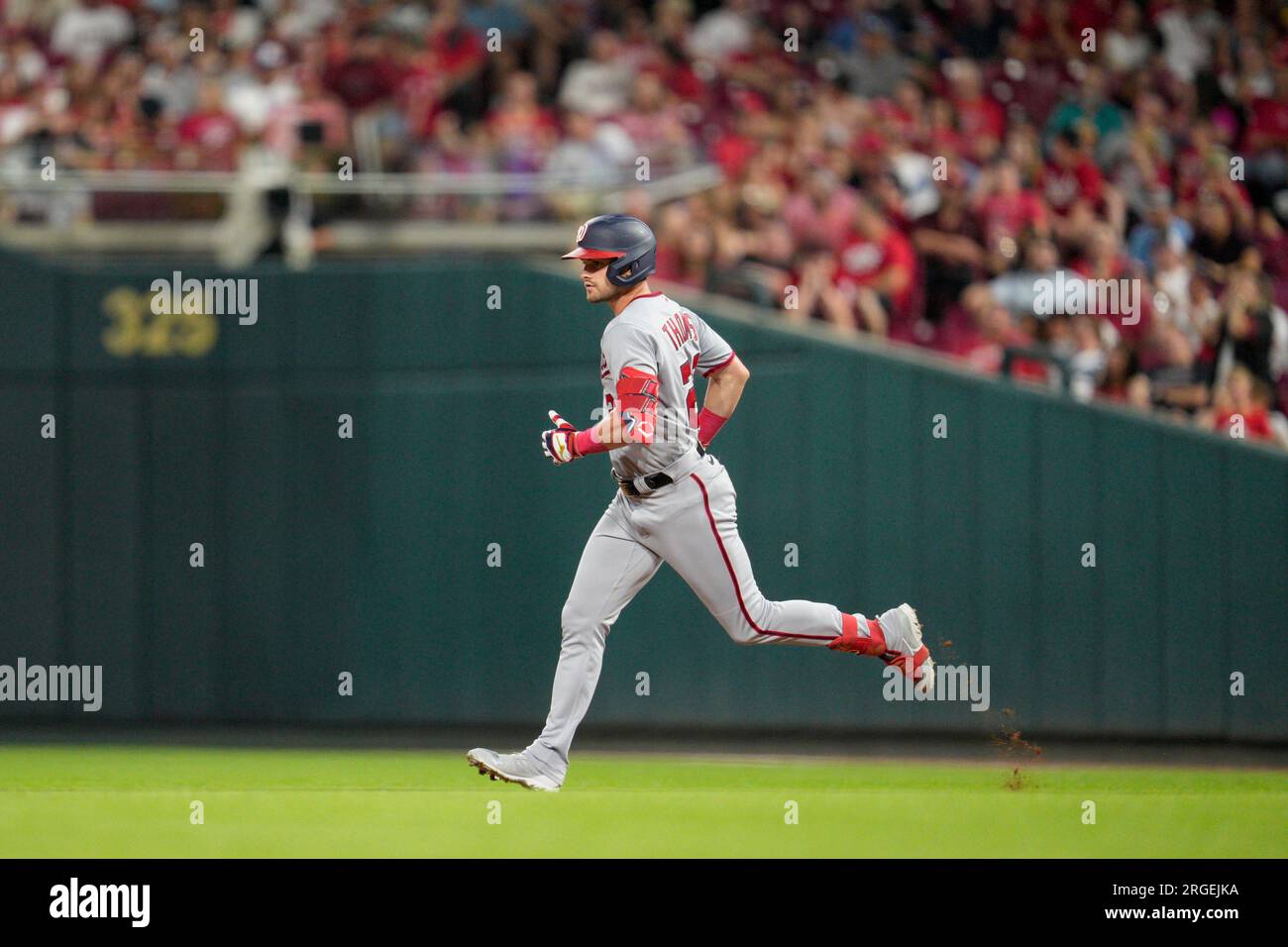 Washington Nationals' Lane Thomas (28) rounds the bases after hitting a ...