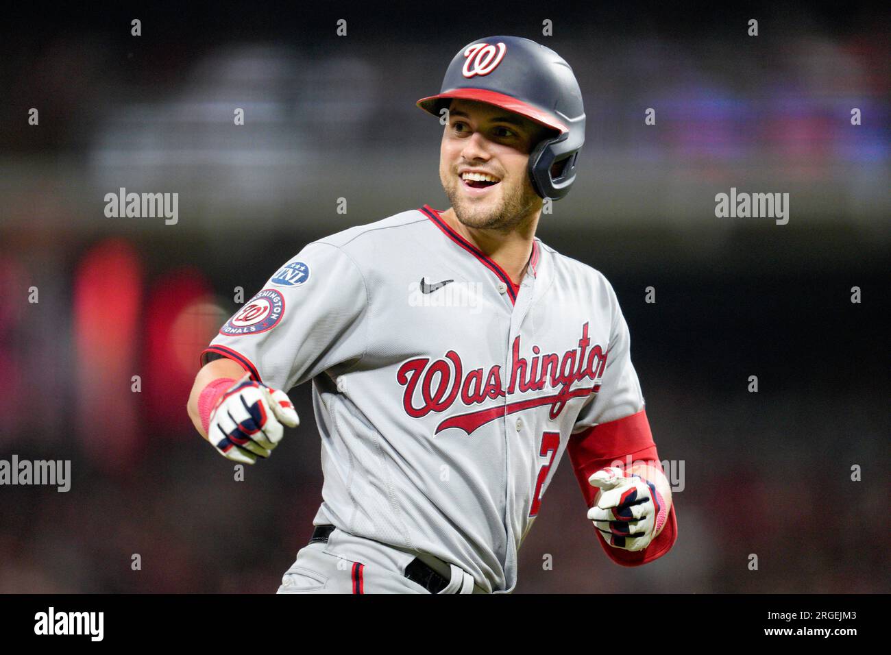 Washington Nationals' Lane Thomas (28) rounds the bases after hitting a ...