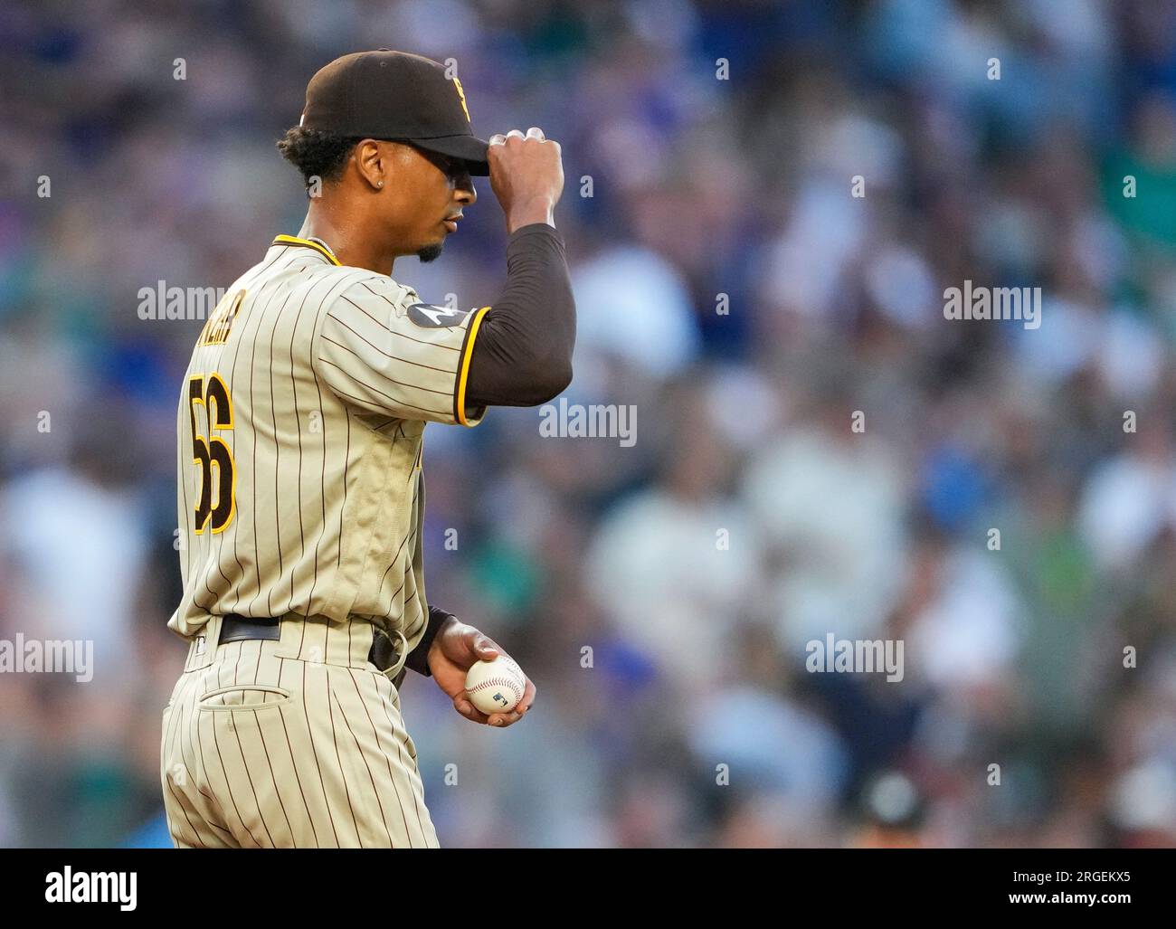 San Diego Padres relief pitcher Ray Kerr walks back to the mound after ...