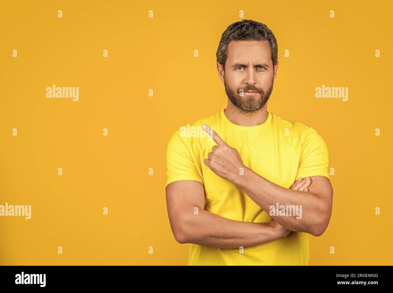 photo of man pointing at advertisement offer, copy space. man pointing ...