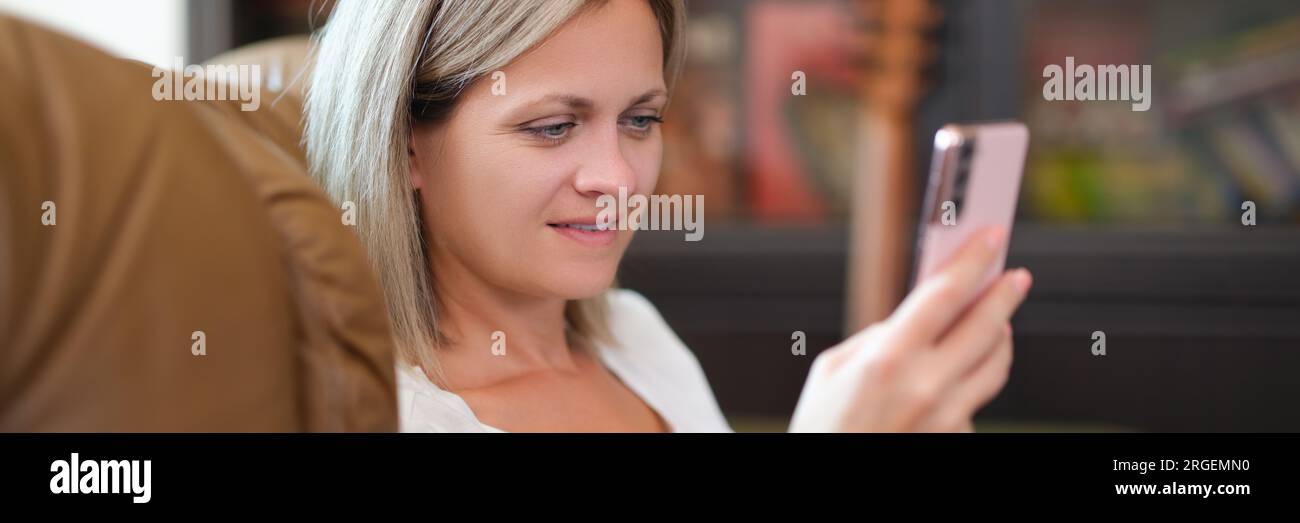 Woman reading messages surfing hi-res stock photography and images - Alamy