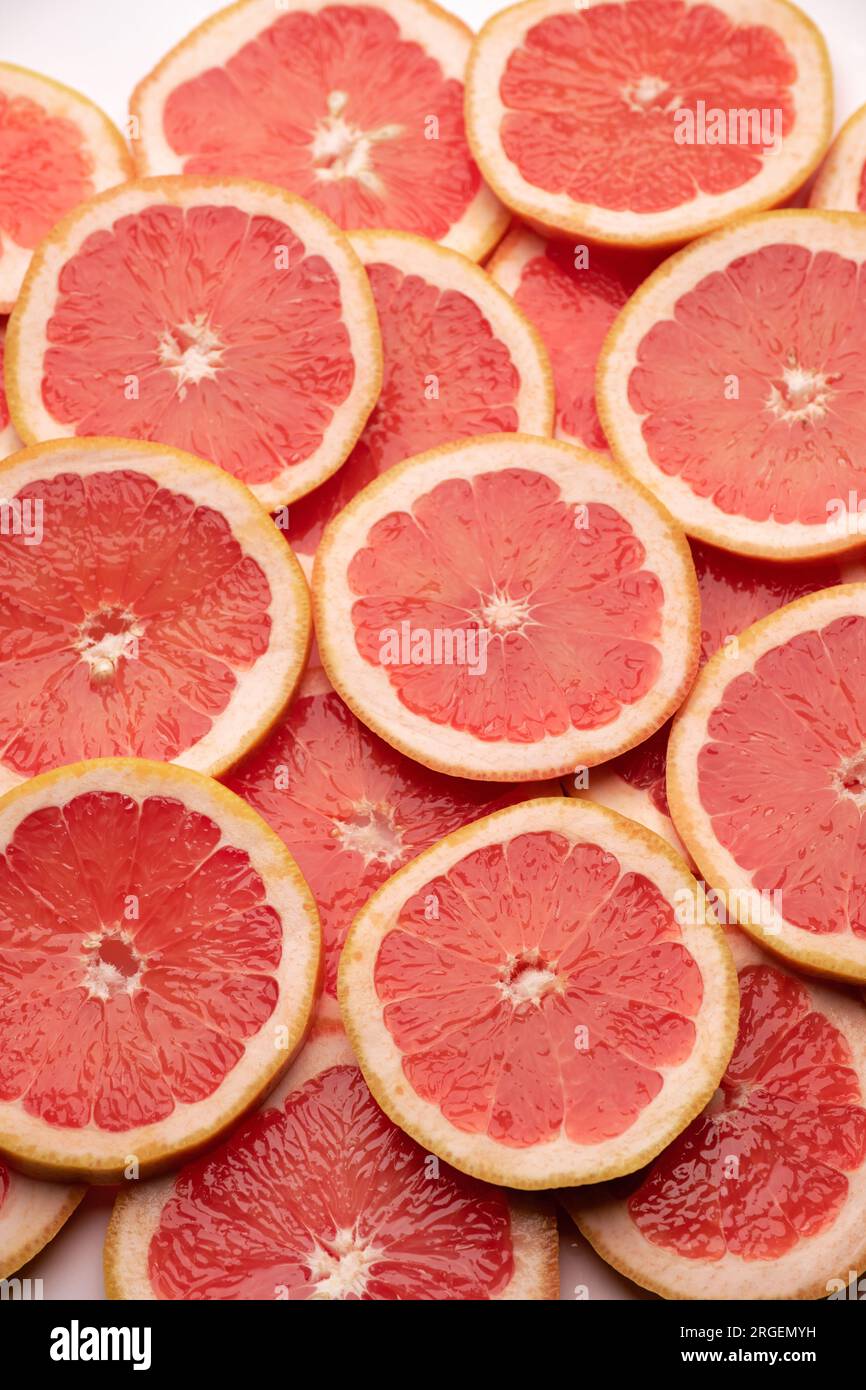 top down background view made of Fresh Sliced organic grapefruit close ...