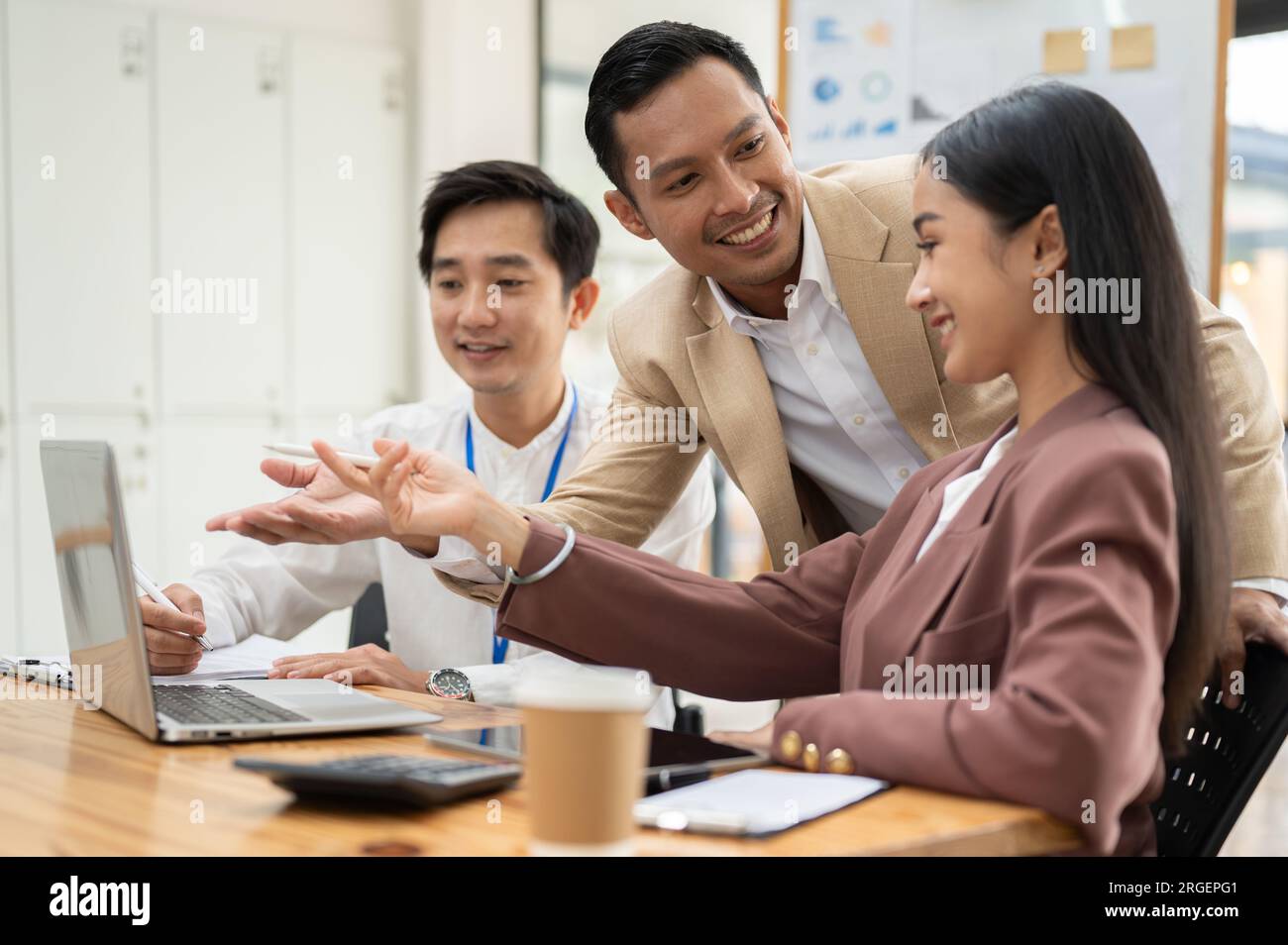 Colleagues sharing ideas corporate project hi-res stock photography and ...