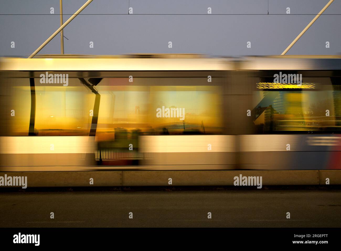 Colour photograph of a train crossing the Erasmus Bridge, Erasmusbrug ...