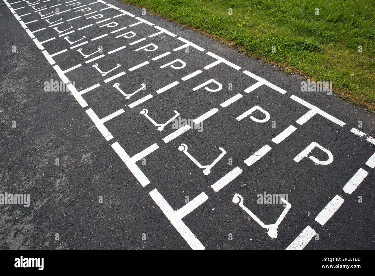 Parking lot sign for scooters Stock Photo - Alamy