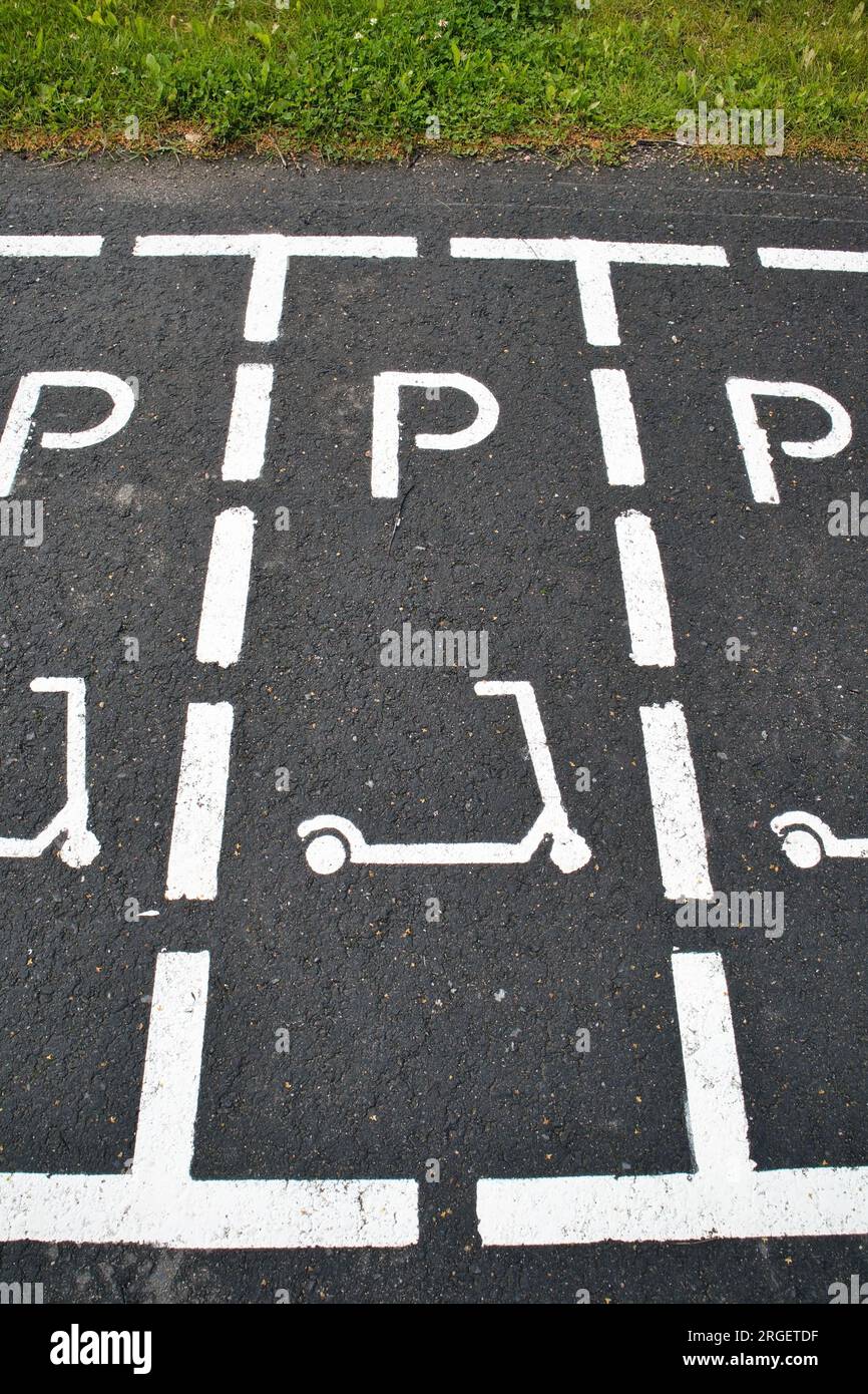 Parking lot sign for scooters Stock Photo - Alamy
