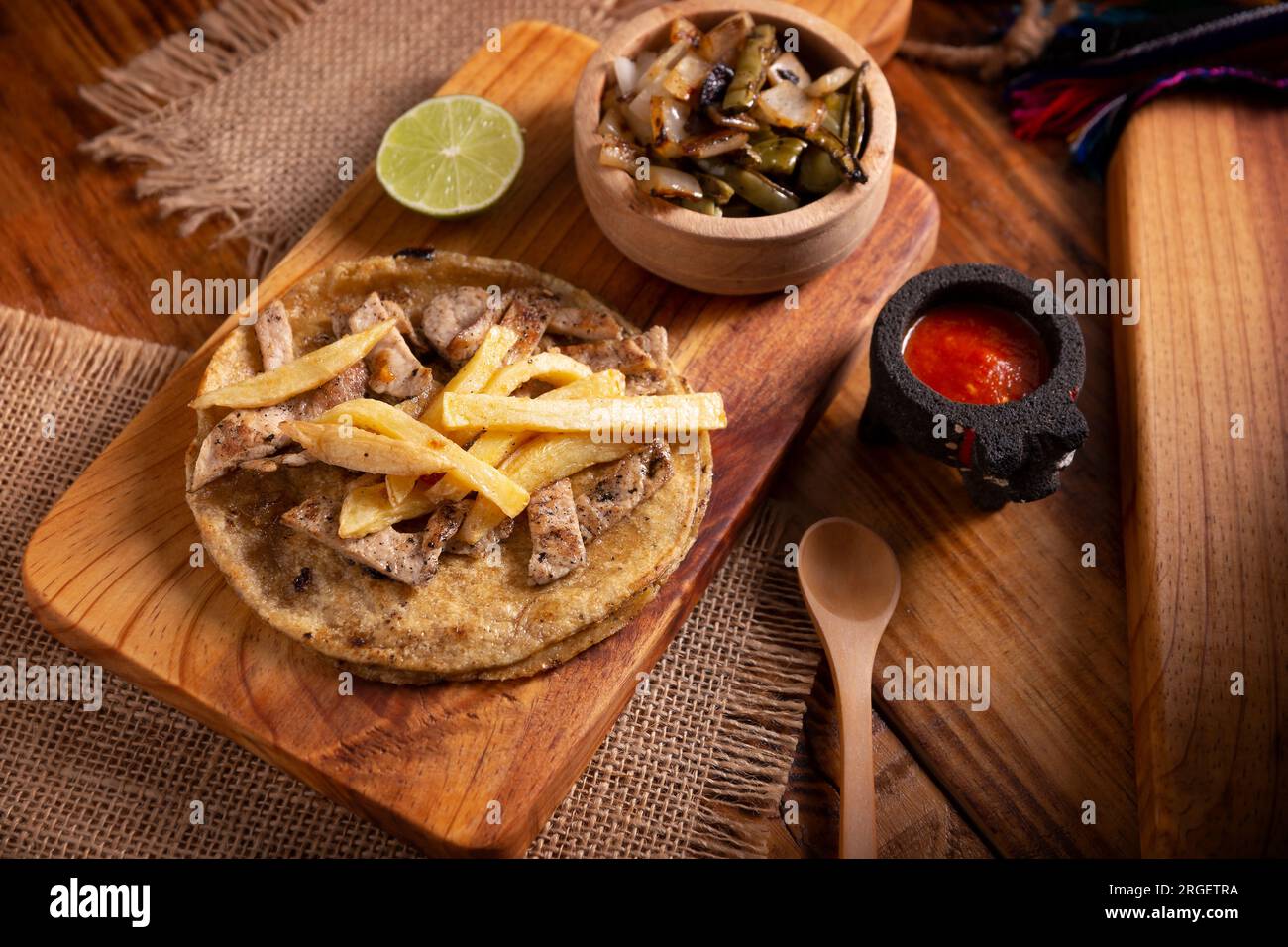 Beef steak taco with french fries. very popular taco in mexico called ...