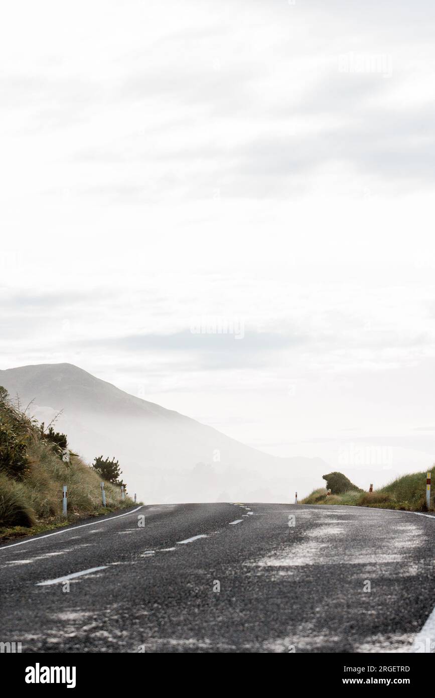 Road over hills hi-res stock photography and images - Alamy