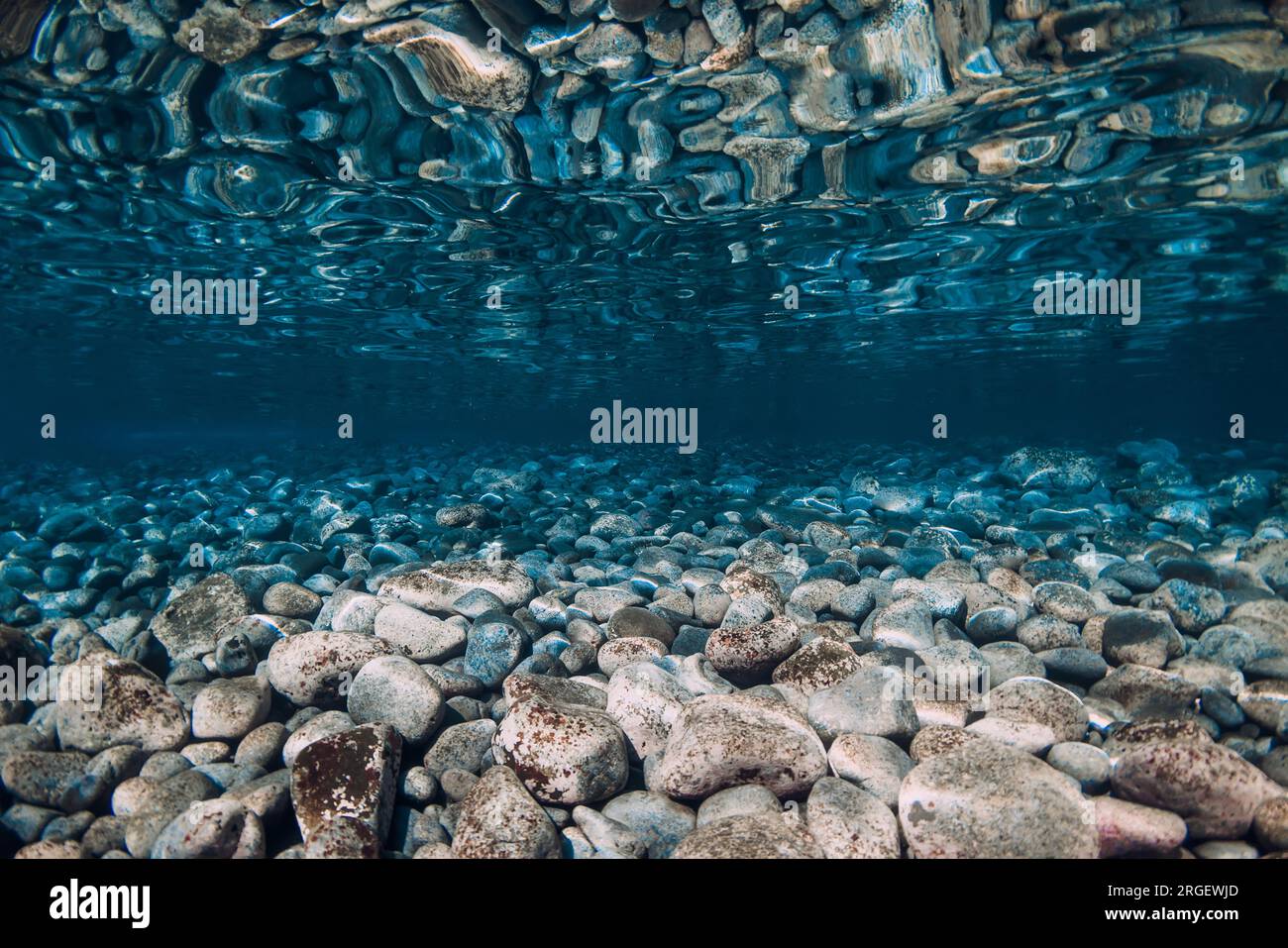 Underwater ocean with stones bottom and reflection on surface Stock ...
