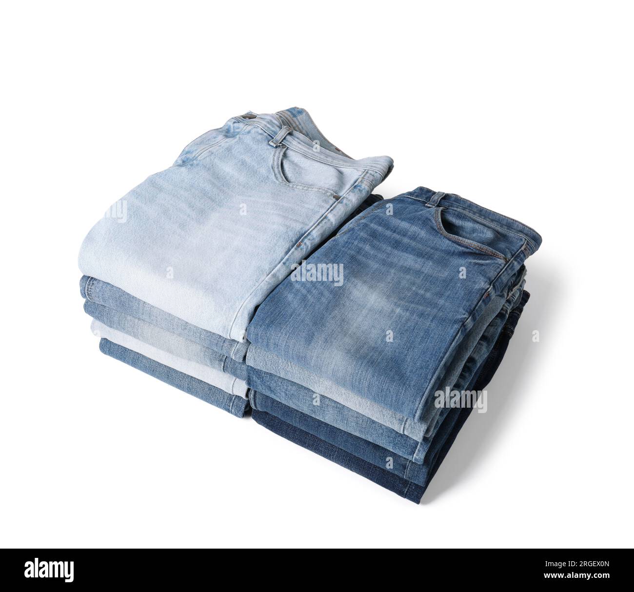 Stacks of different folded jeans isolated on white Stock Photo - Alamy