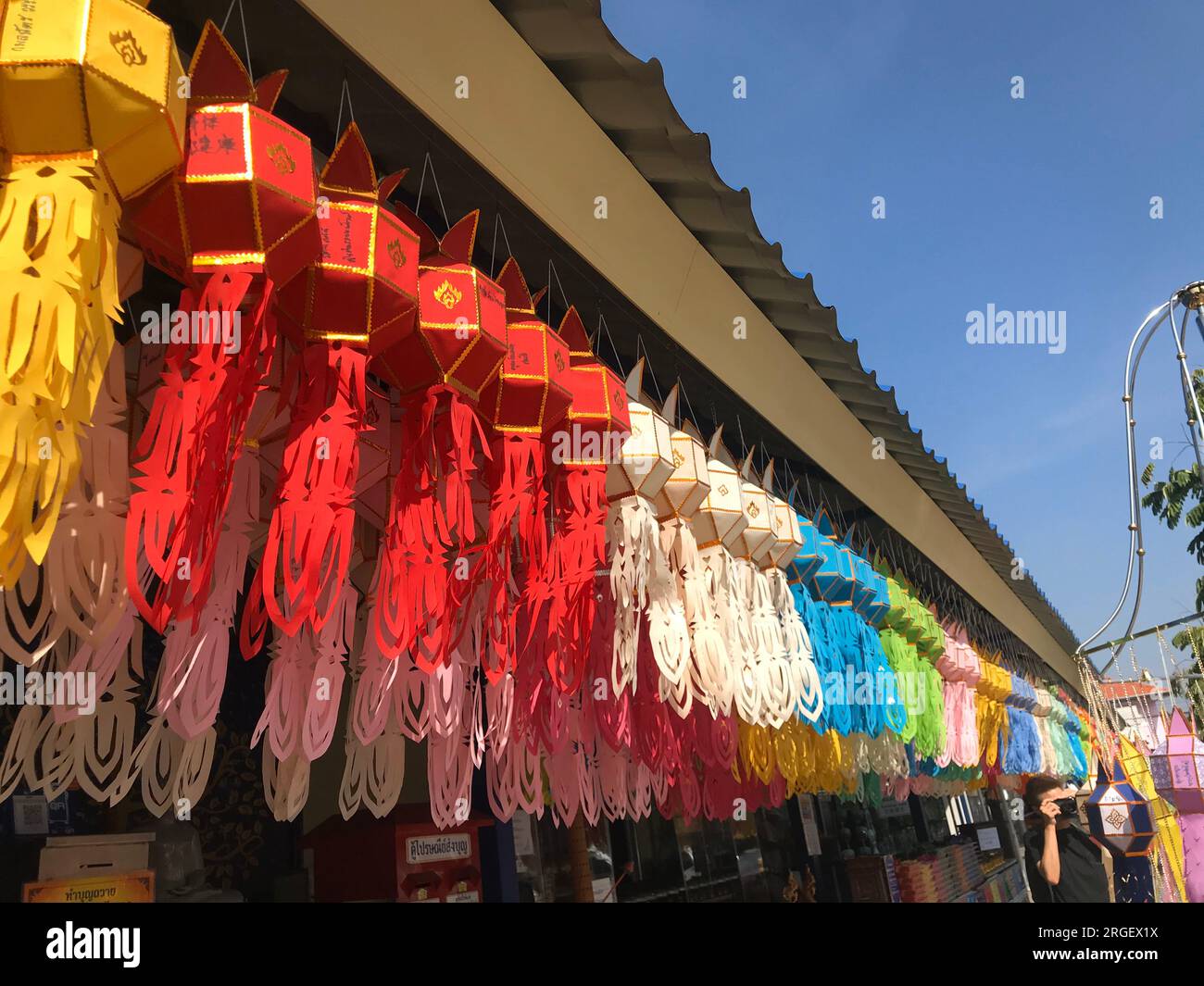 A beautiful of color lantern hanging on the rack in the make merit ...