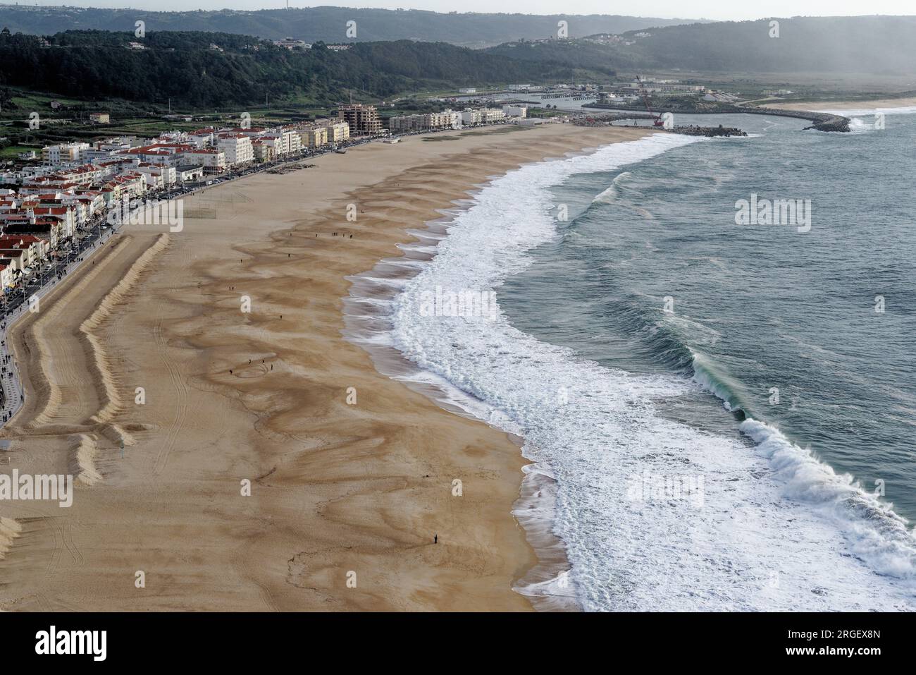Town of Nazare, Portugal - view below the cliffs. Top view of Nazare ...