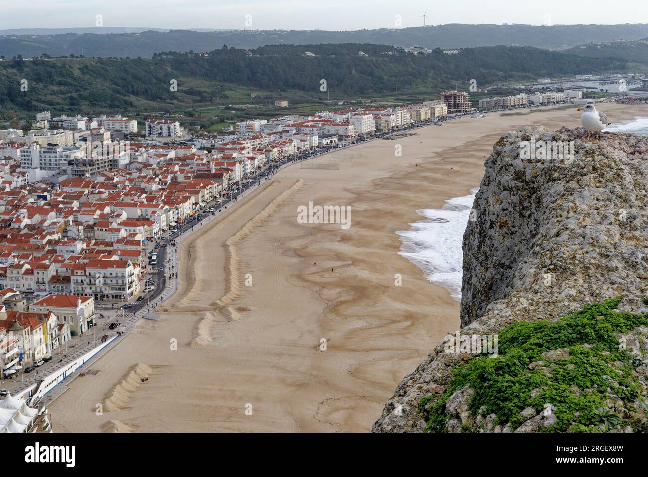 Town of Nazare, Portugal - view below the cliffs. Top view of Nazare ...