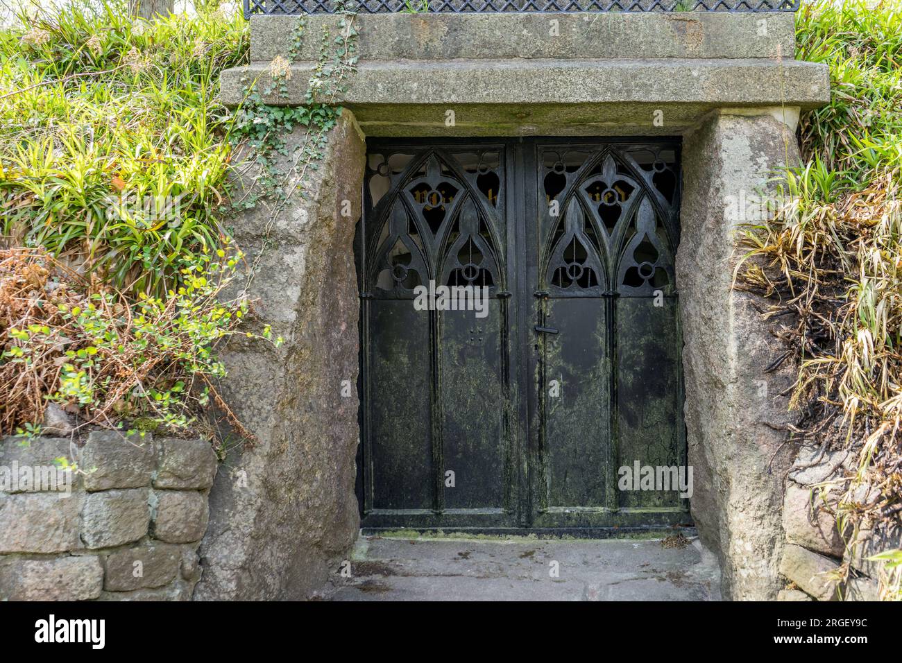 Decorated metal door to the crypt in the old cemetery in Flensburg ...