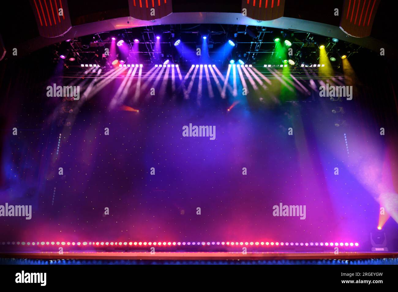 Elegant theater stage with colored lights and smoke Stock Photo - Alamy