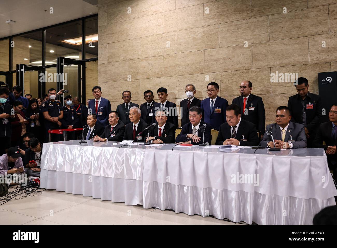 Bangkok, Thailand. 9th Aug, 2023. Pheu Thai Party leader Chonlanan Srikaew, fourth left, and ...