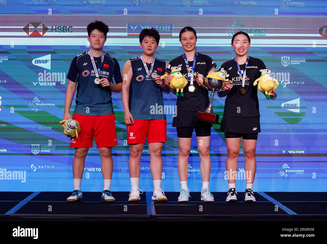 Winning team Kim So Yeong and Kong Hee Yong of Korea pose with runner up Liu Sheng Shu and Tan ...