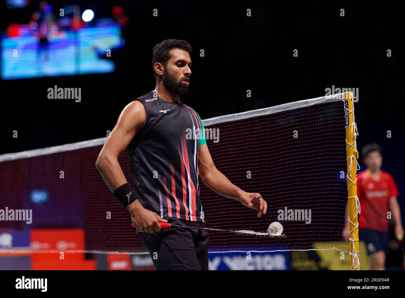 Prannoy H. S. of India replacing the shuttlecock during the men's ...