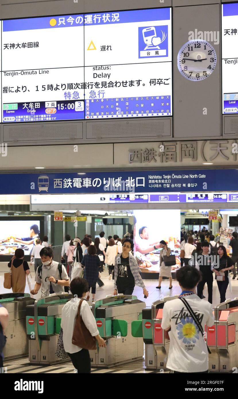 People use the Fukuoka Station of Nishitetsu Line in Fukuoka Prefecture ...