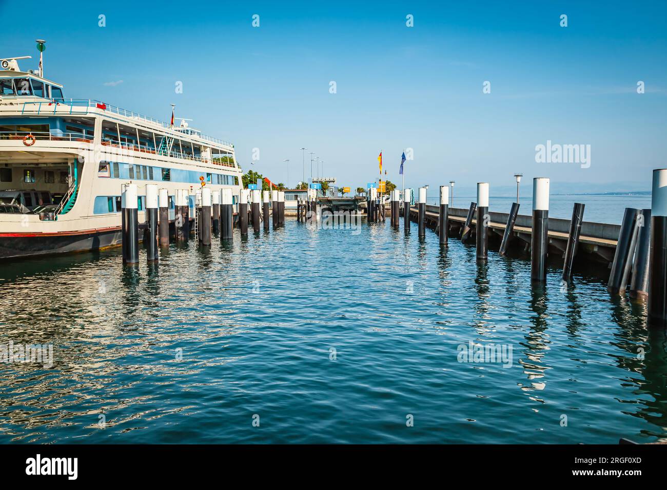 Ferry coming to port for loading or unloading by a port pier Stock ...