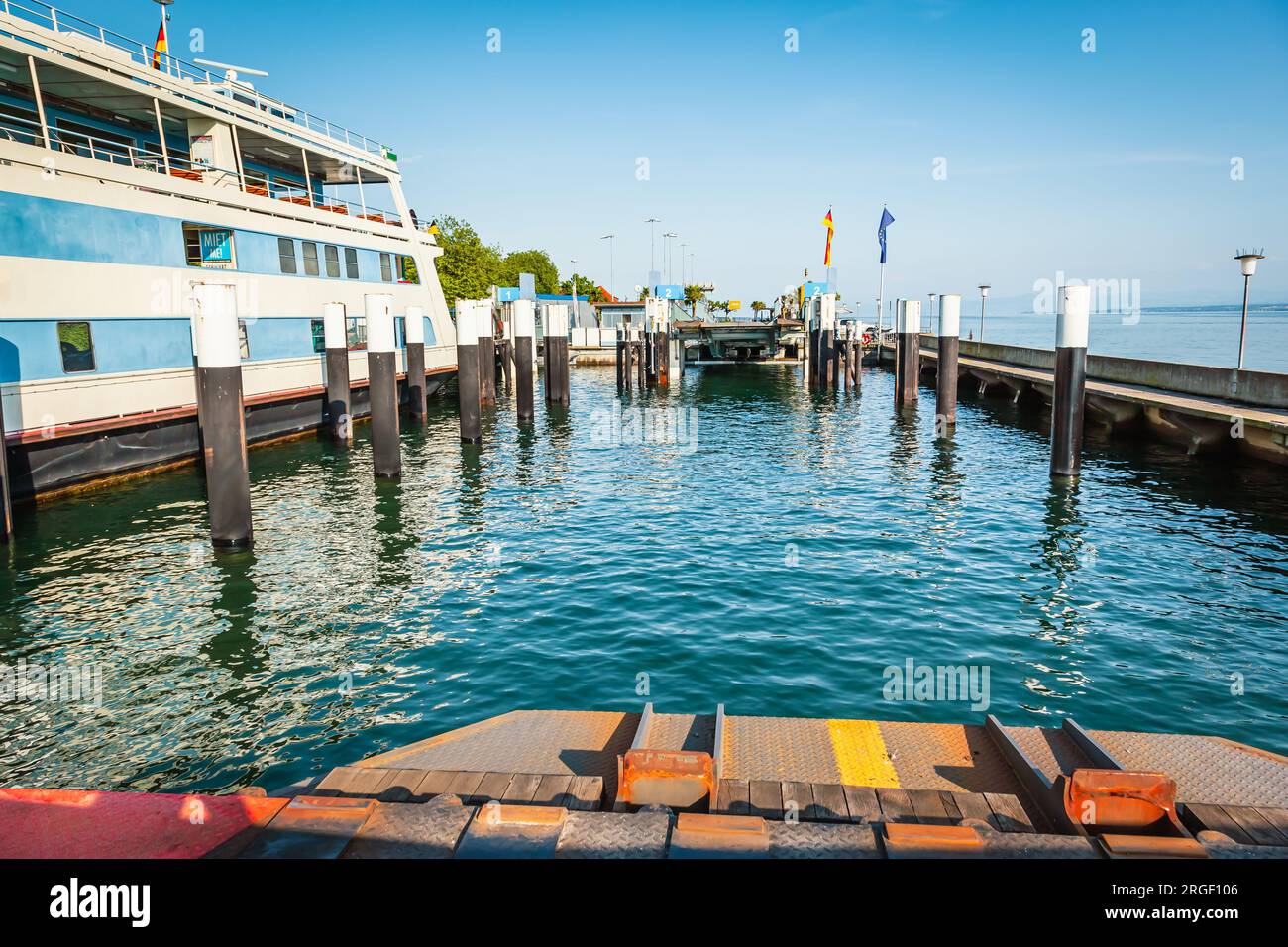 Ferry coming to port for loading or unloading by a port pier Stock ...