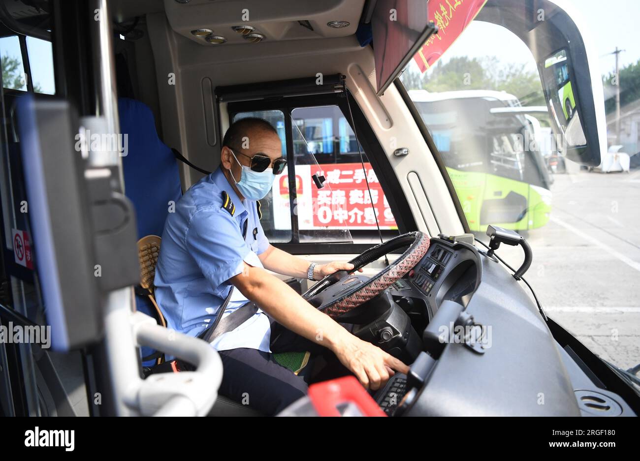 Zhuozhou, China's Hebei Province. 9th Aug, 2023. A driver prepares to ...