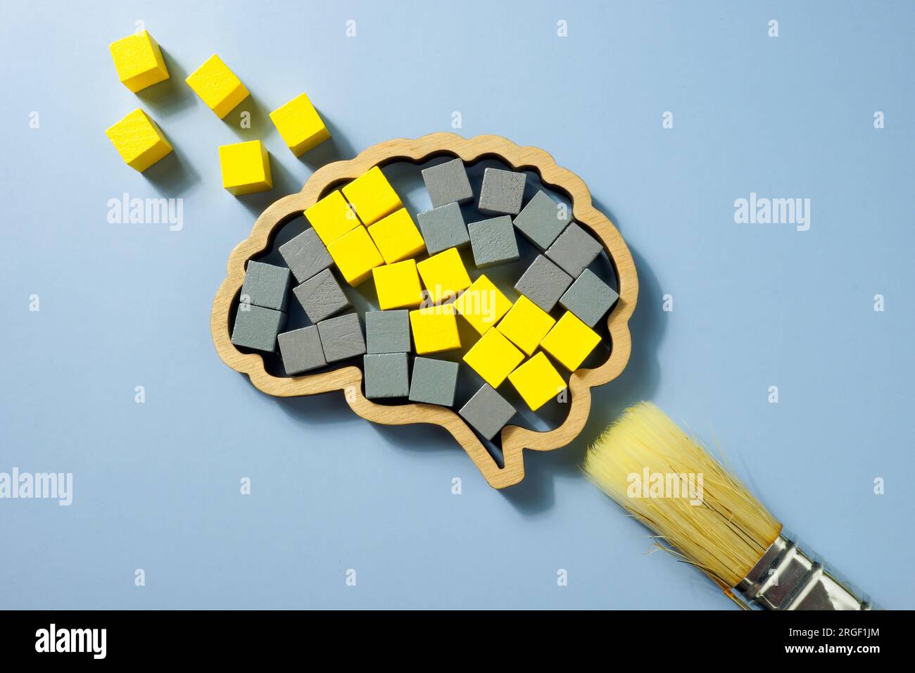 A Brush, brain shape with yellow and gray cubes. Cognitive Behavioral ...