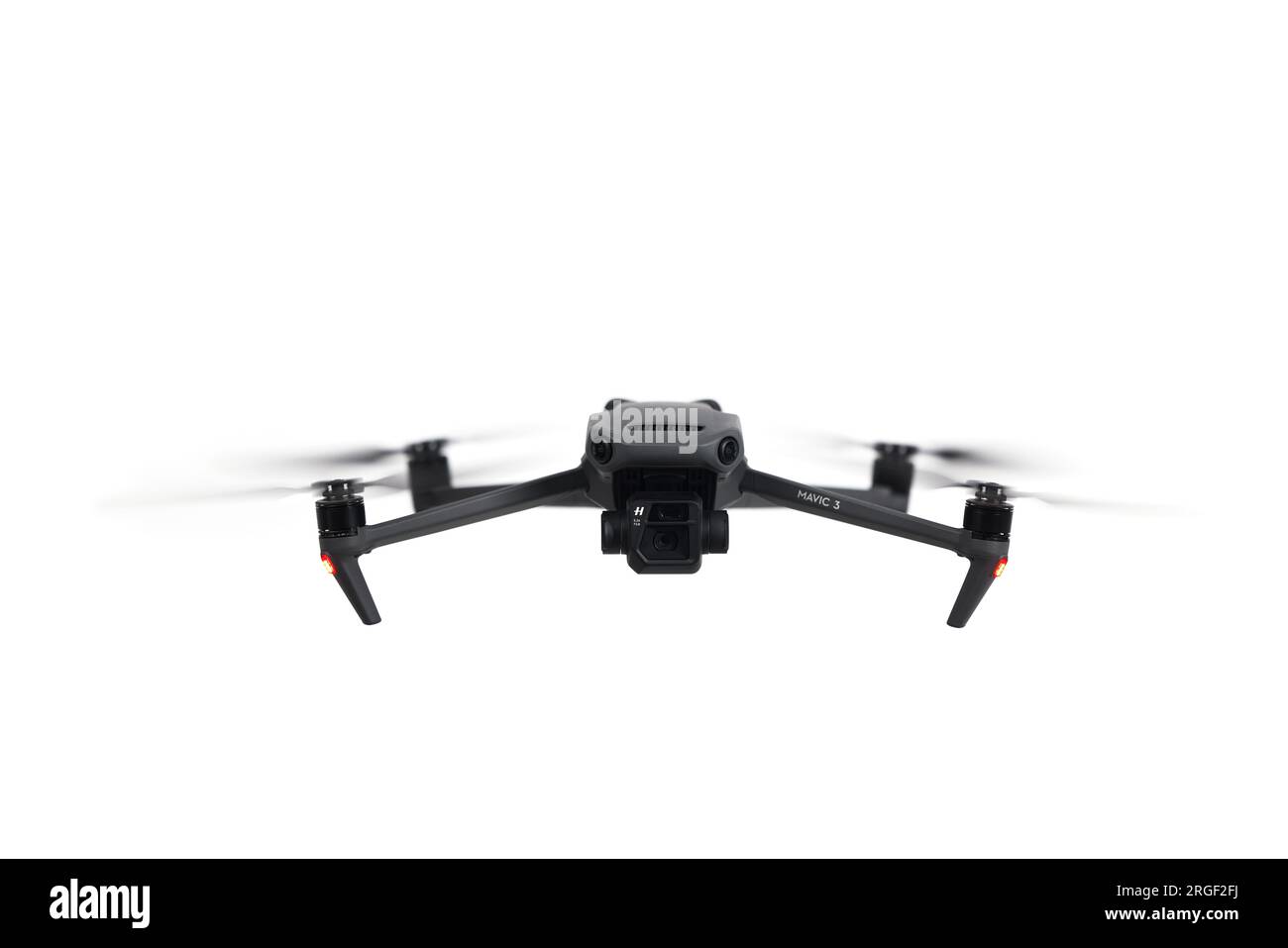 Copter in flight. DJI Mavic 3 - Flying on withe background. Closeup ...