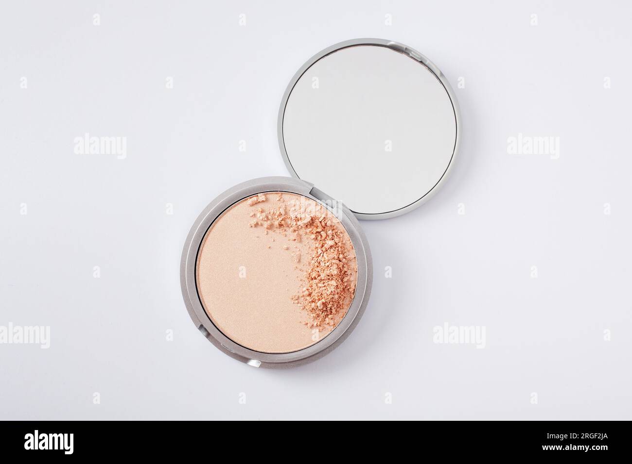 Beautiful eyeshadow palette on white with crushed sample. Makeup ...