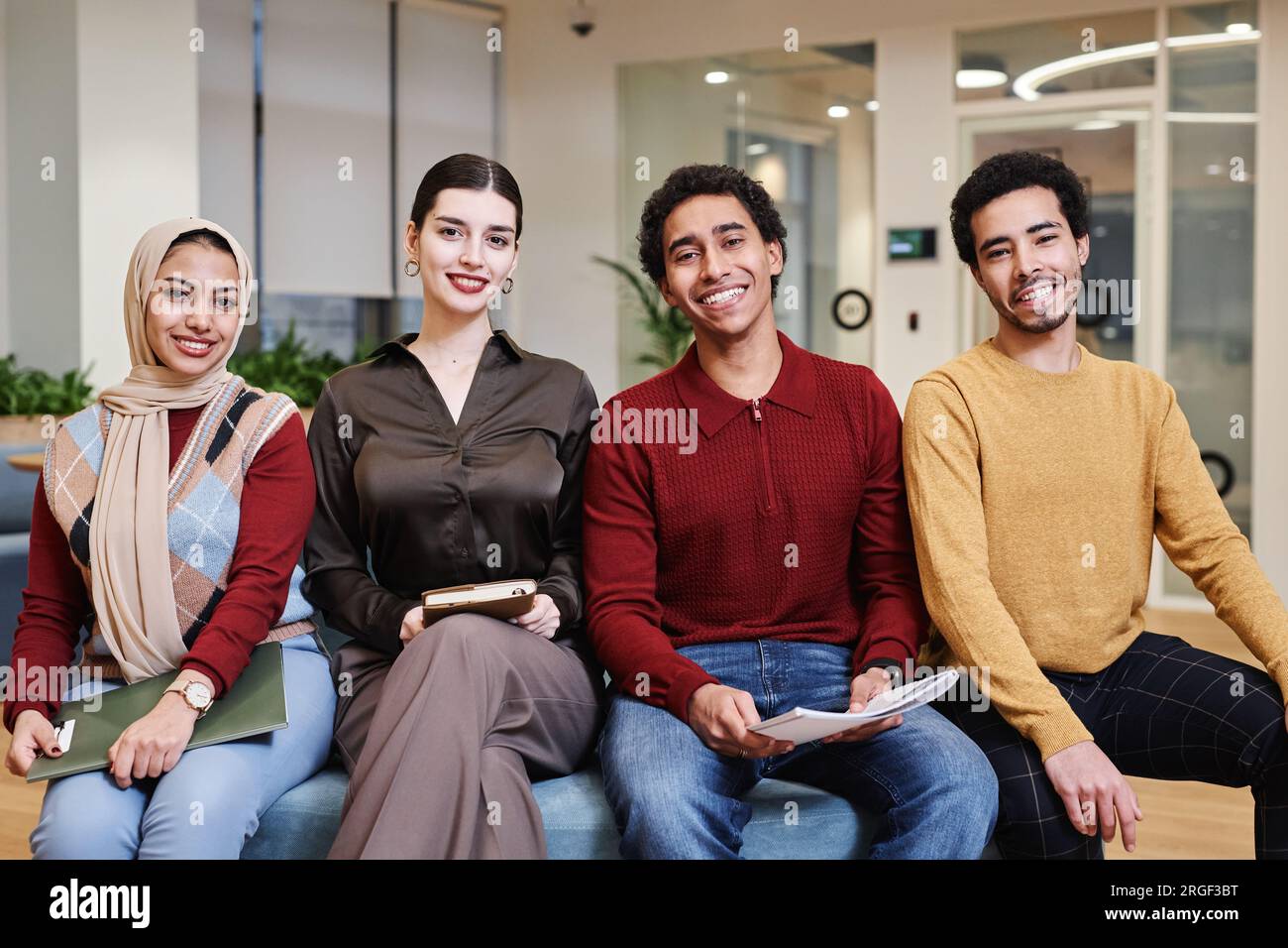Front view portrait of young Middle Eastern business team posing in ...