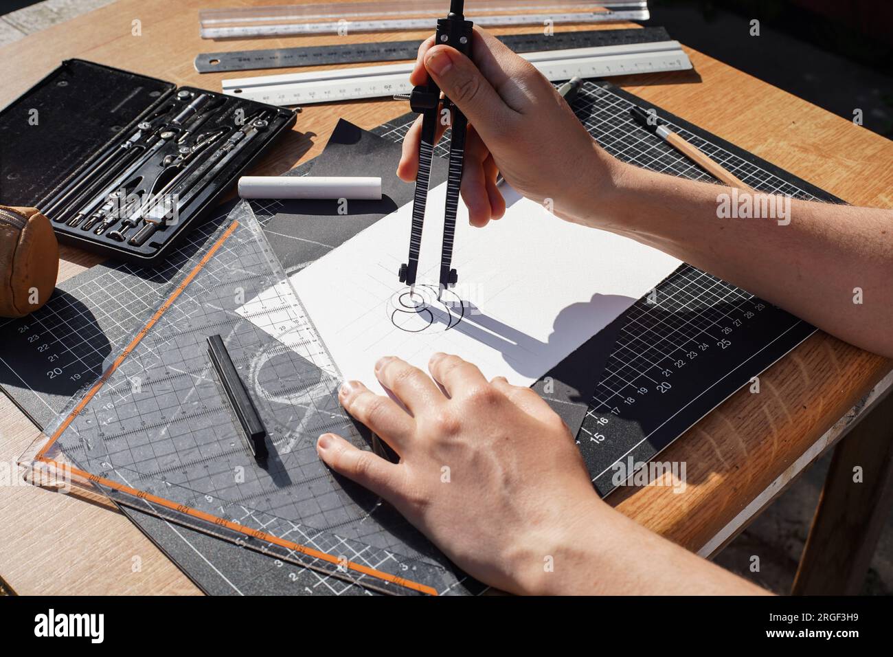 Architect and designer working accurately on a project drawing sketches ...