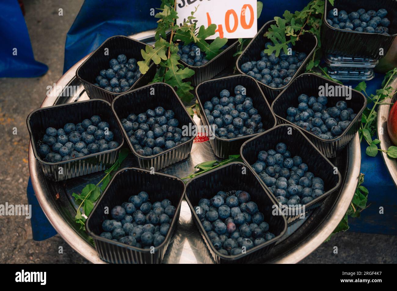 Blueberry sale in the traditional farm Turkish market, a counter filled ...
