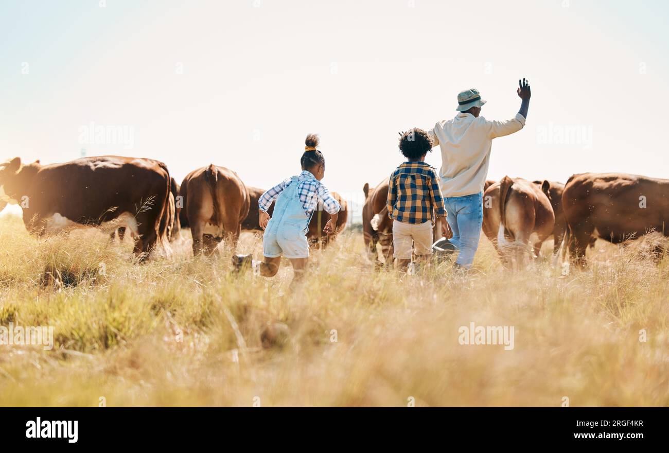 Animal, father and children on family farm outdoor with cattle ...