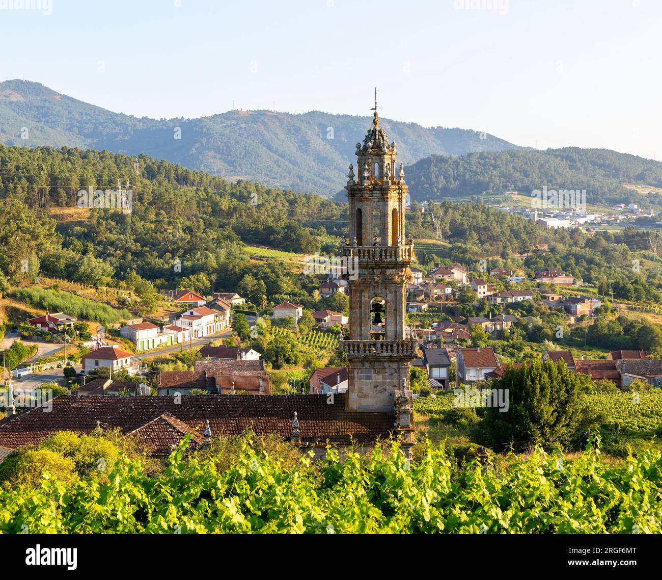Tower of church Igrexa de Santo André surrounding countryside, Campo ...
