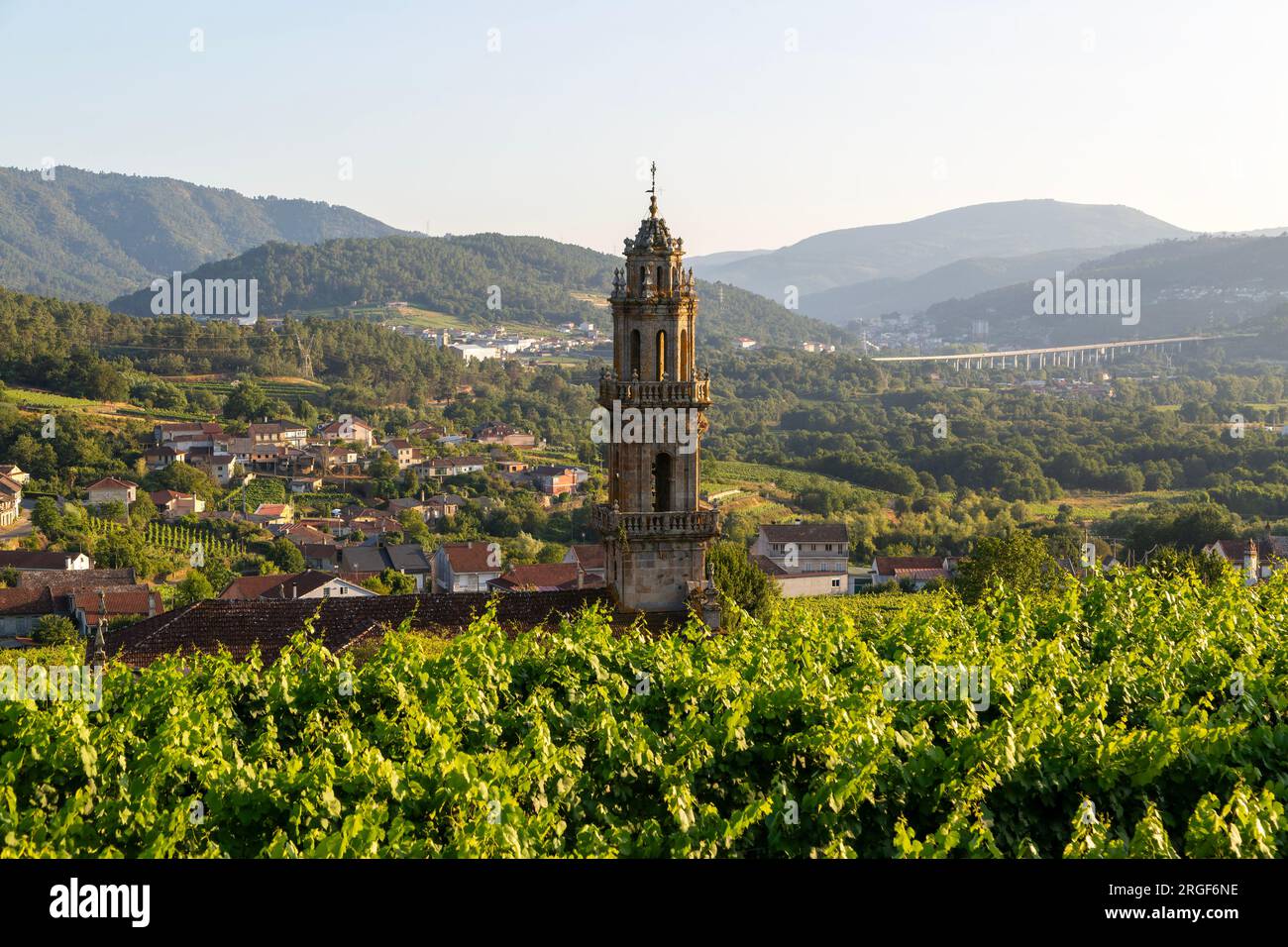 Tower of church Igrexa de Santo André surrounding countryside, Campo ...