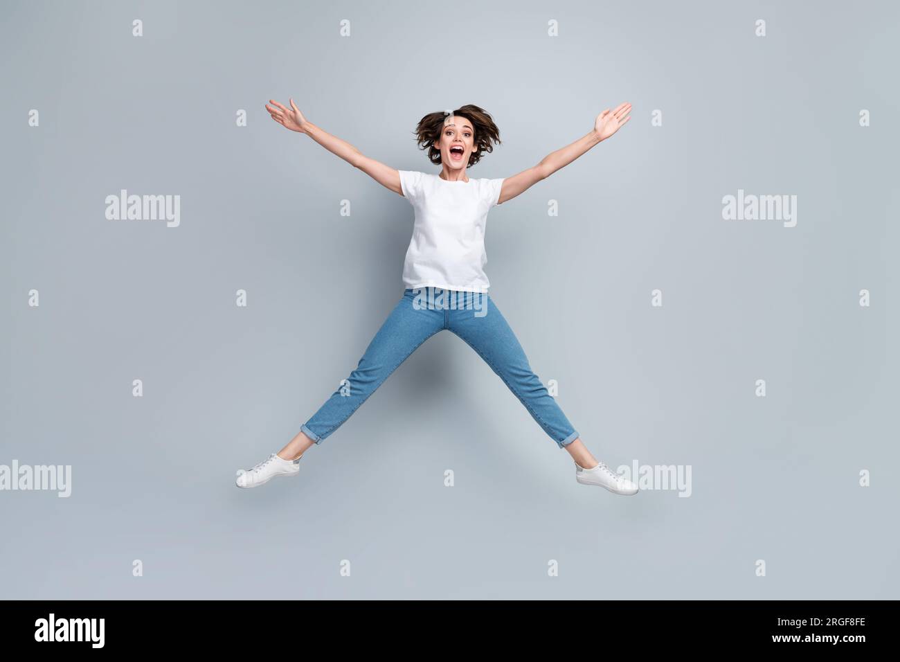 Full size photo of astonished ecstatic girl dressed white t-shirt jeans ...