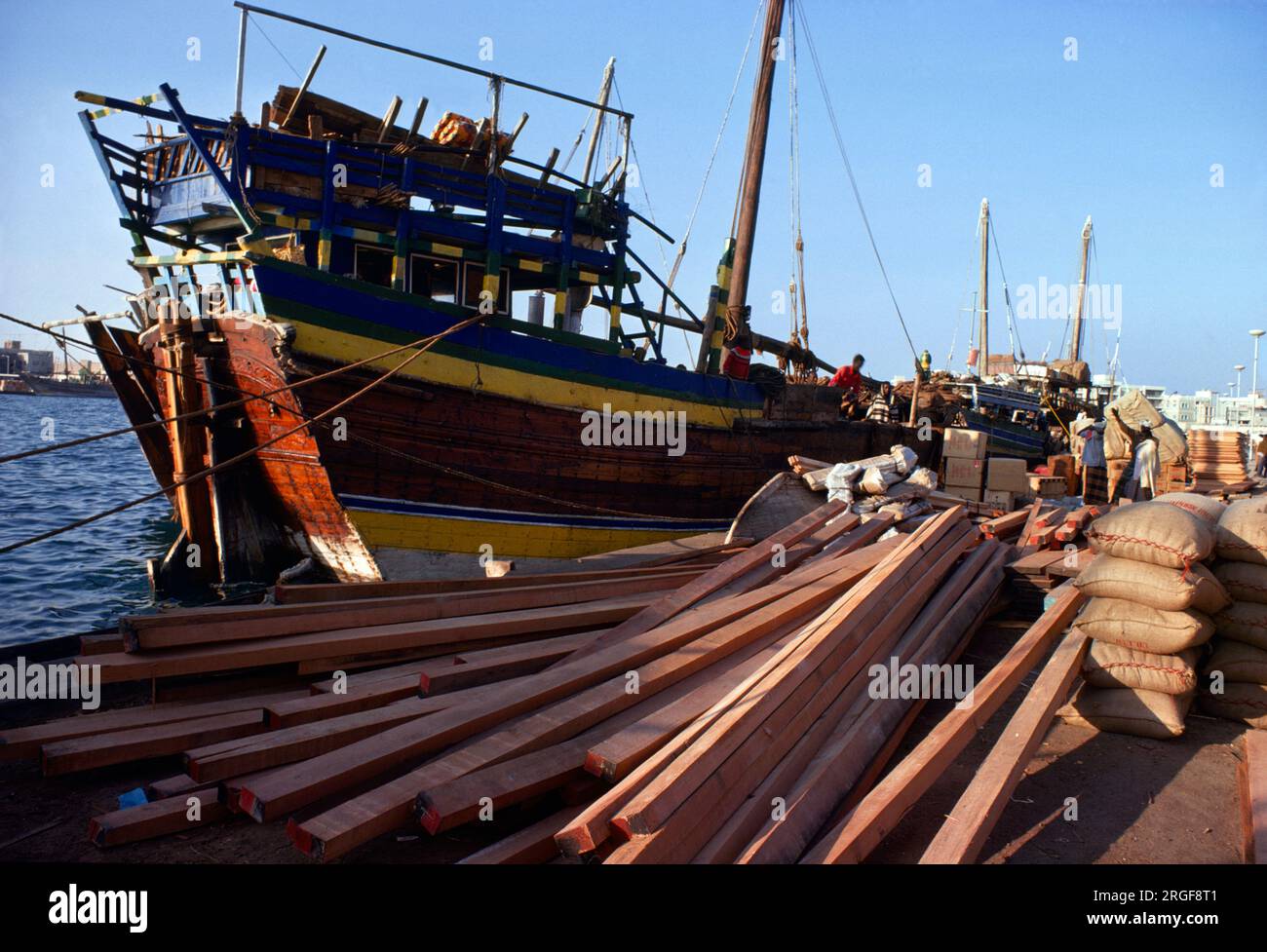Dubai UAE Dhow & Timber on Creekside Stock Photo - Alamy