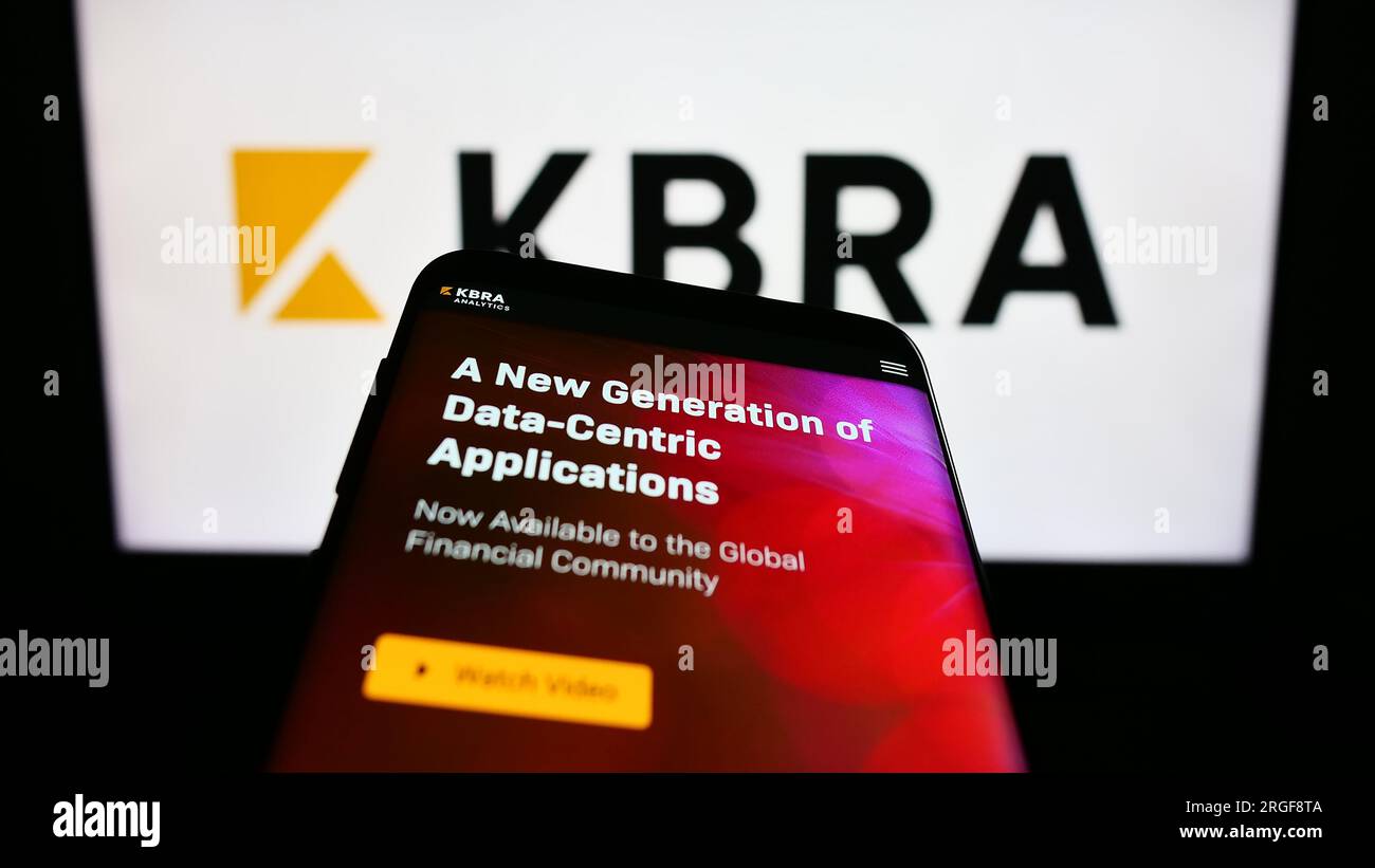 Mobile phone with website of US company Kroll Bond Rating Agency LLC (KBRA) on screen in front ...
