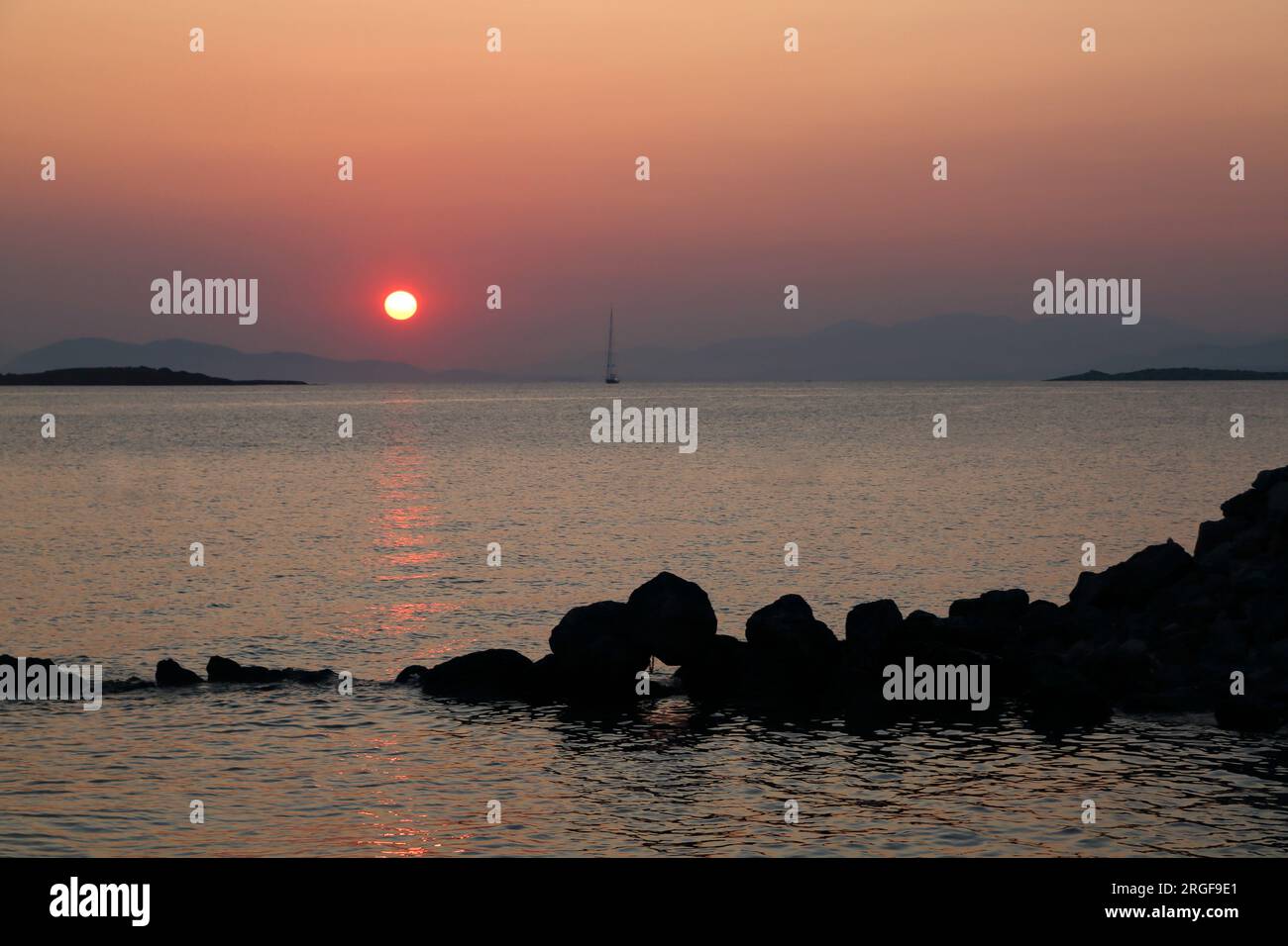 Vouliagmeni Beach Athens Greece Sunset over Sea Stock Photo - Alamy